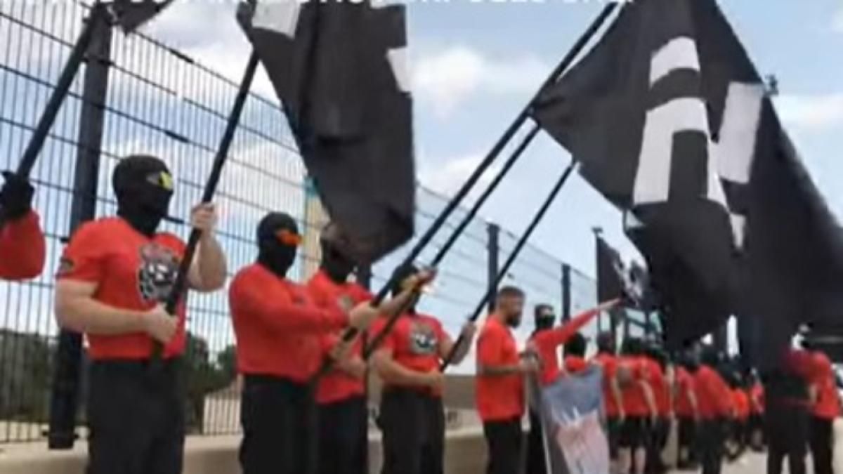 Groups of white supremacists march in Orlando with neo-Nazi flags ...