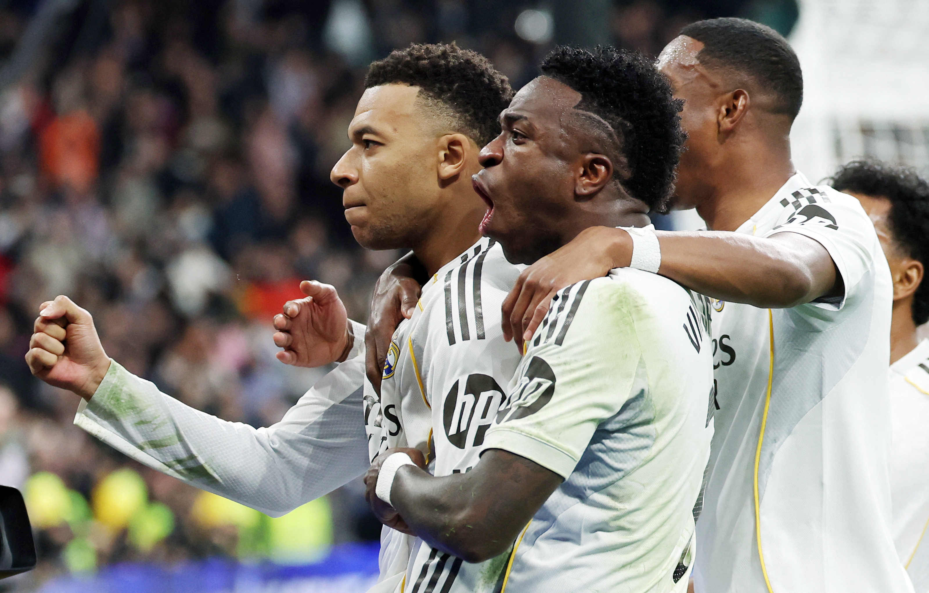 Mbappe penalty earns Real Madrid late win over nine-man Rayo