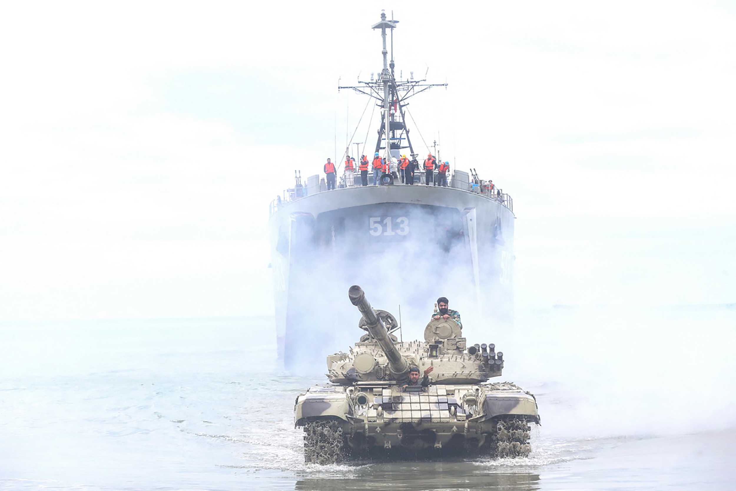 Iran launched military maneuvers in the Strait of Hormuz on the eve of ...