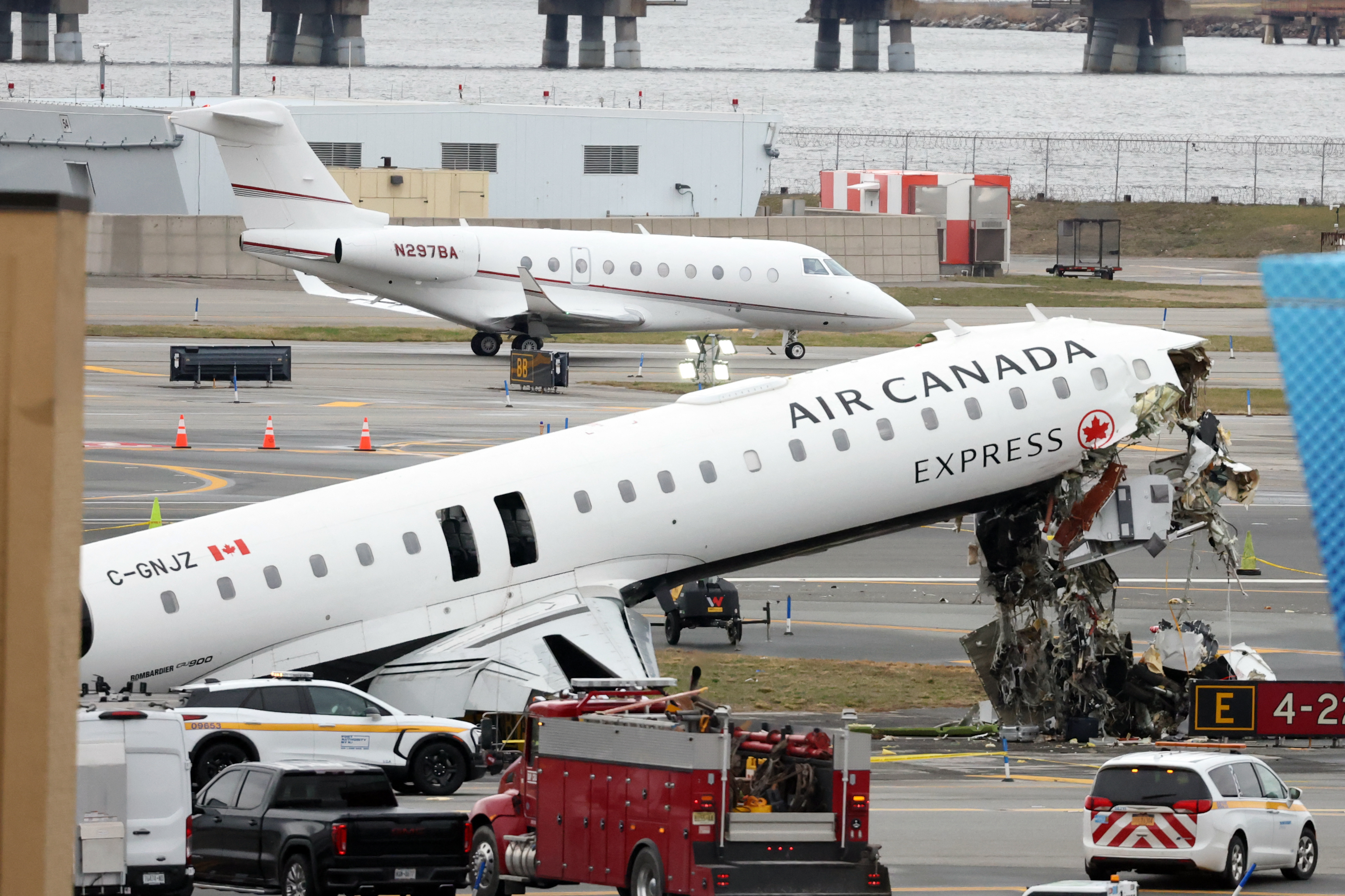 LaGuardia Airport: Pilots of plane crash identified as investigators ...