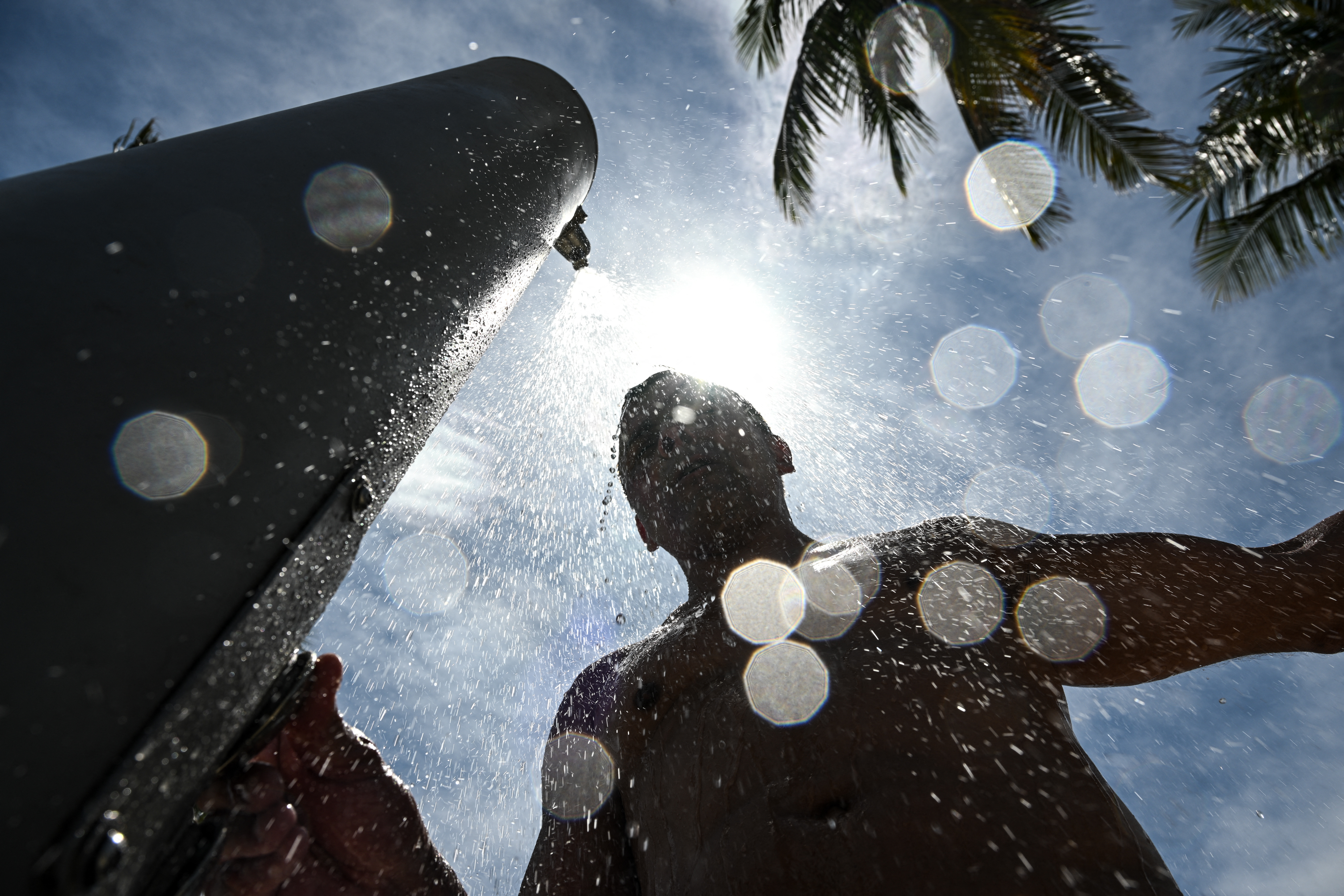Miami sets up cooling stations and air-conditioned shelters to combat ...